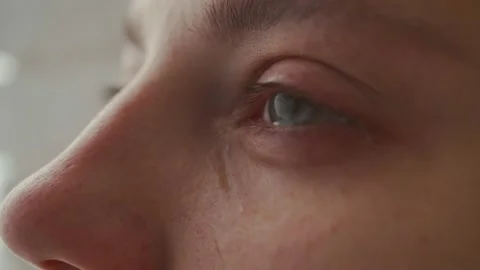 Eyes of a crying girl with a trace of te... | Stock Video | Pond5