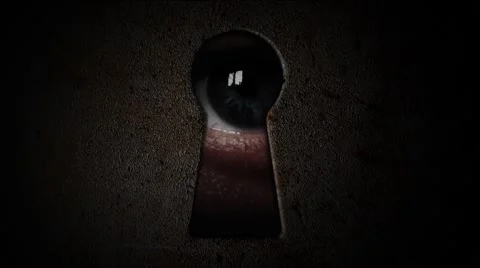 Eyes watching through a keyhole. Watch t... | Stock Video | Pond5
