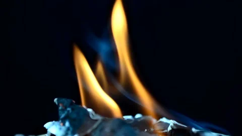 Fabric burning process. Fire burns on a ... | Stock Video | Pond5