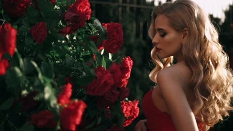 Fabulous girl with red lips in red dress... | Stock Video | Pond5