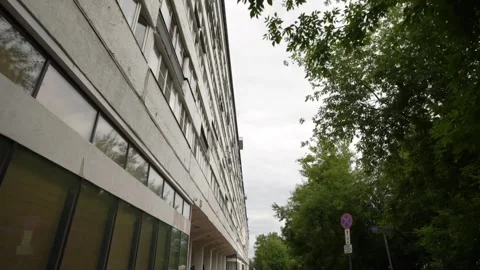 The facade of an unusual long apartment ... | Stock Video | Pond5