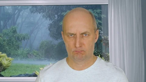 Face angry man looking in camera on back... | Stock Video | Pond5