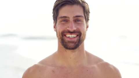 Face, beach and smile with a shirtless m... | Stock Video | Pond5
