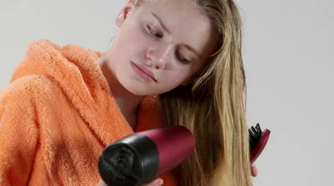 Girl Blow Drying Hair Stock Footage ~ Royalty Free Stock Videos | Pond5