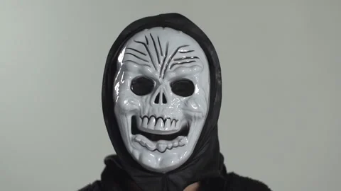 Face covered in Skeleton Mask | Stock Video | Pond5