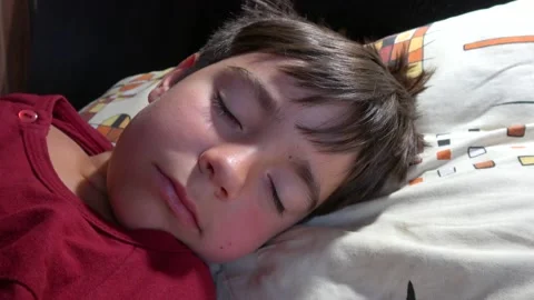 Face of deep sleeping boy in the artific... | Stock Video | Pond5
