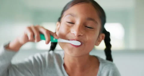Face, girl and brushing teeth with welln... | Stock Video | Pond5