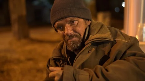 Face of lonely cold homeless man on the ... | Stock Video | Pond5
