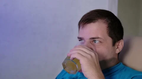 the face of a plump man taking a few sip... | Stock Video | Pond5