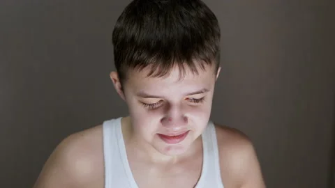 Face Portrait of a Smiling Guilty Child ... | Stock Video | Pond5