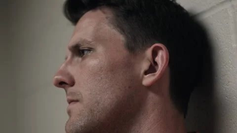 Face of a sad angry, unhappy man. Prison... | Stock Video | Pond5