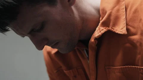 Face of a sad, unhappy, prisoner, prison... | Stock Video | Pond5