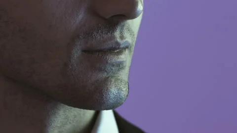 The face of a talking man on the violet ... | Stock Video | Pond5