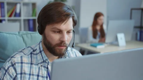 Face of young man operator in the call c... | Stock Video | Pond5