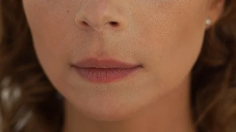 Face young woman close up. Lower part wo... | Stock Video | Pond5