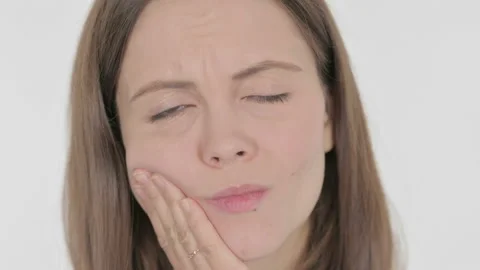 Face of Young Woman with Toothache on Wh... | Stock Video | Pond5