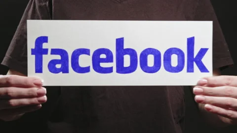 facebook logo social media promotion han... | Stock Video | Pond5