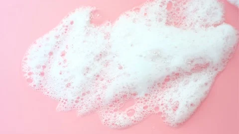 Facial wash foam close-up top view on pi... | Stock Video | Pond5
