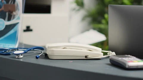 Facility counter with landline phone | Stock Video | Pond5