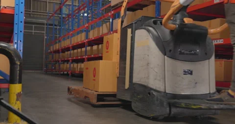 Factory workers deliver boxes and packag... | Stock Video | Pond5