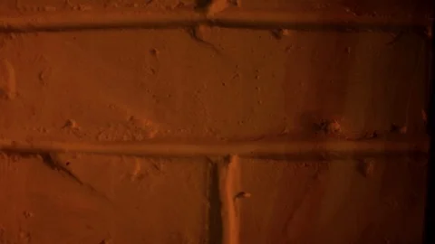 faint flickering orange fire lights ligh... | Stock Video | Pond5