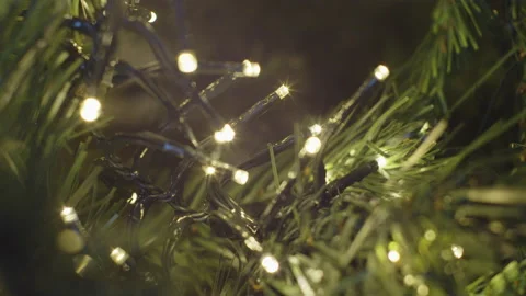 Fairy lights on artificial tree branch 4... | Stock Video | Pond5