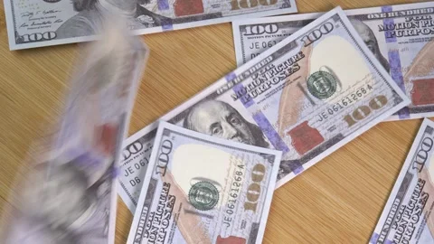Fake US dollars fall on the table. Count... | Stock Video | Pond5