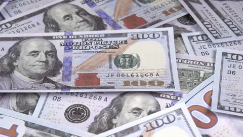 Fake US dollars rotating as background. ... | Stock Video | Pond5
