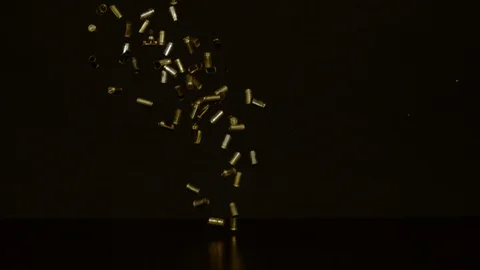 Bullet Shells Falling Stock Footage ~ Royalty Free Stock Videos | Pond5