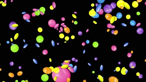 Falling colorful smarties. Isolated swee... | Stock Video | Pond5