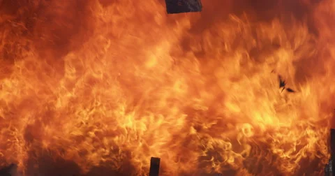 Falling debris in the middle of a raging... | Stock Video | Pond5