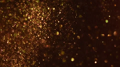 Falling Golden Particles and Bokeh. | Stock Video | Pond5