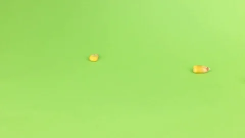 Falling grains of corn on a pile of corn... | Stock Video | Pond5