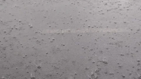 Falling into large puddle on asphalt, fl... | Stock Video | Pond5