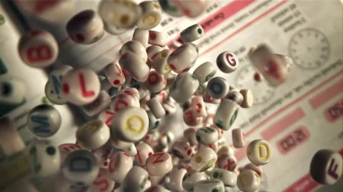 Falling letters on an open textbook. Fil... | Stock Video | Pond5