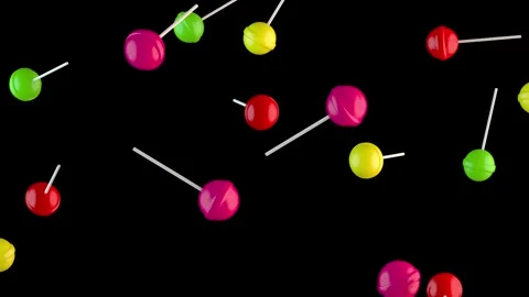 Falling lollipop candies isolated with a... | Stock Video | Pond5
