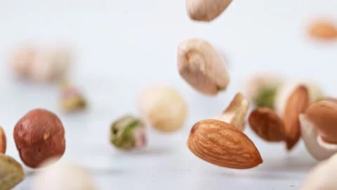 Nuts Falling Stock Footage ~ Royalty Free Stock Videos | Pond5