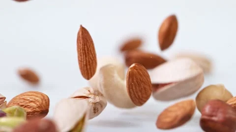 Nuts Falling Stock Footage ~ Royalty Free Stock Videos | Pond5