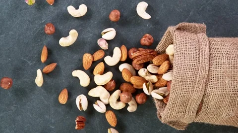 Nuts Falling Stock Footage ~ Royalty Free Stock Videos | Pond5