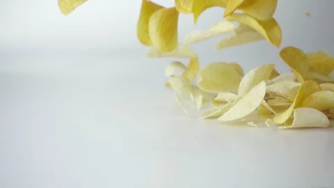 Potato Chips Falling Stock Footage ~ Royalty Free Stock Videos | Pond5