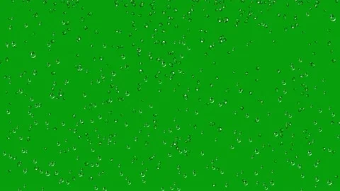 Falling rain drops on glass with green s... | Stock Video | Pond5