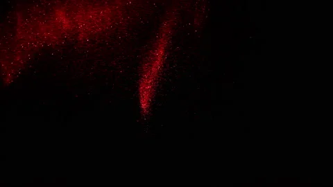 Falling red dust particles on alpha back... | Stock Video | Pond5