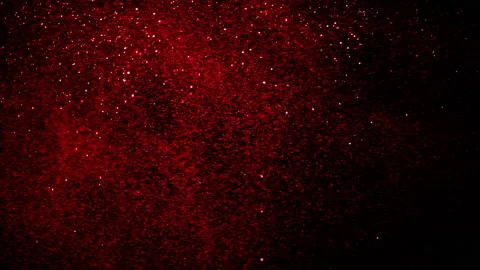 Falling of red dust particles in the bac... | Stock Video | Pond5