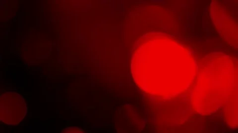 Falling red shiny dust particles in alph... | Stock Video | Pond5