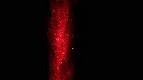 Falling red shiny particles in the alpha... | Stock Video | Pond5