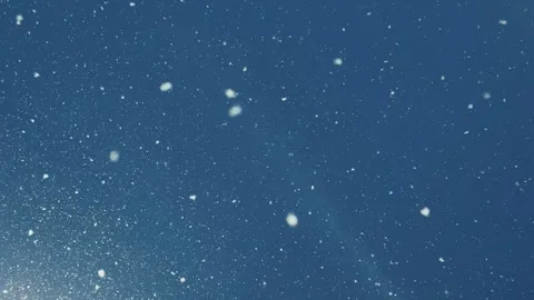 Falling snow in the light. Flying snow o... | Stock Video | Pond5