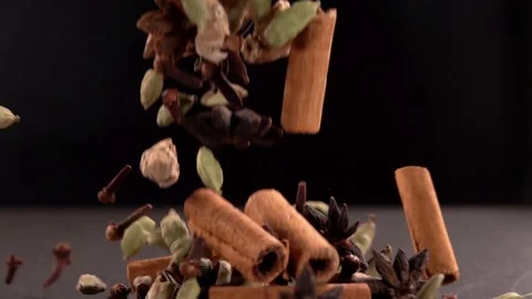 Falling Spices on Black Background Slow ... | Stock Video | Pond5