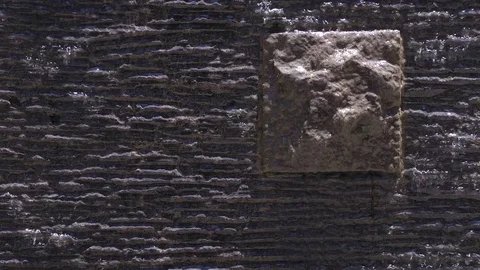 Falling water on a stone wall | Stock Video | Pond5