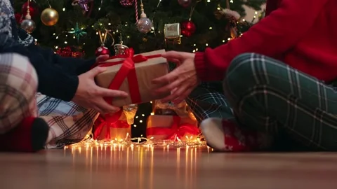 family couple giving Christmas gifts box... | Stock Video | Pond5