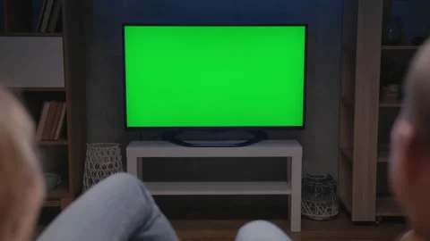 Family Couple Watching Green Screen TV S... | Stock Video | Pond5